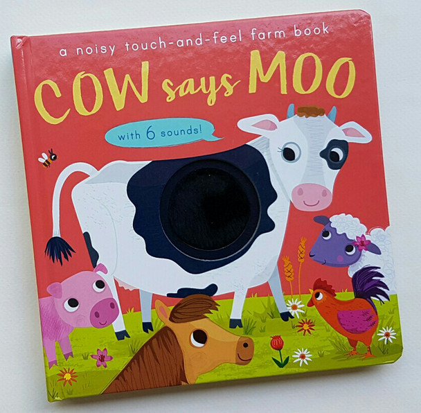 Touch and feel cow says moo